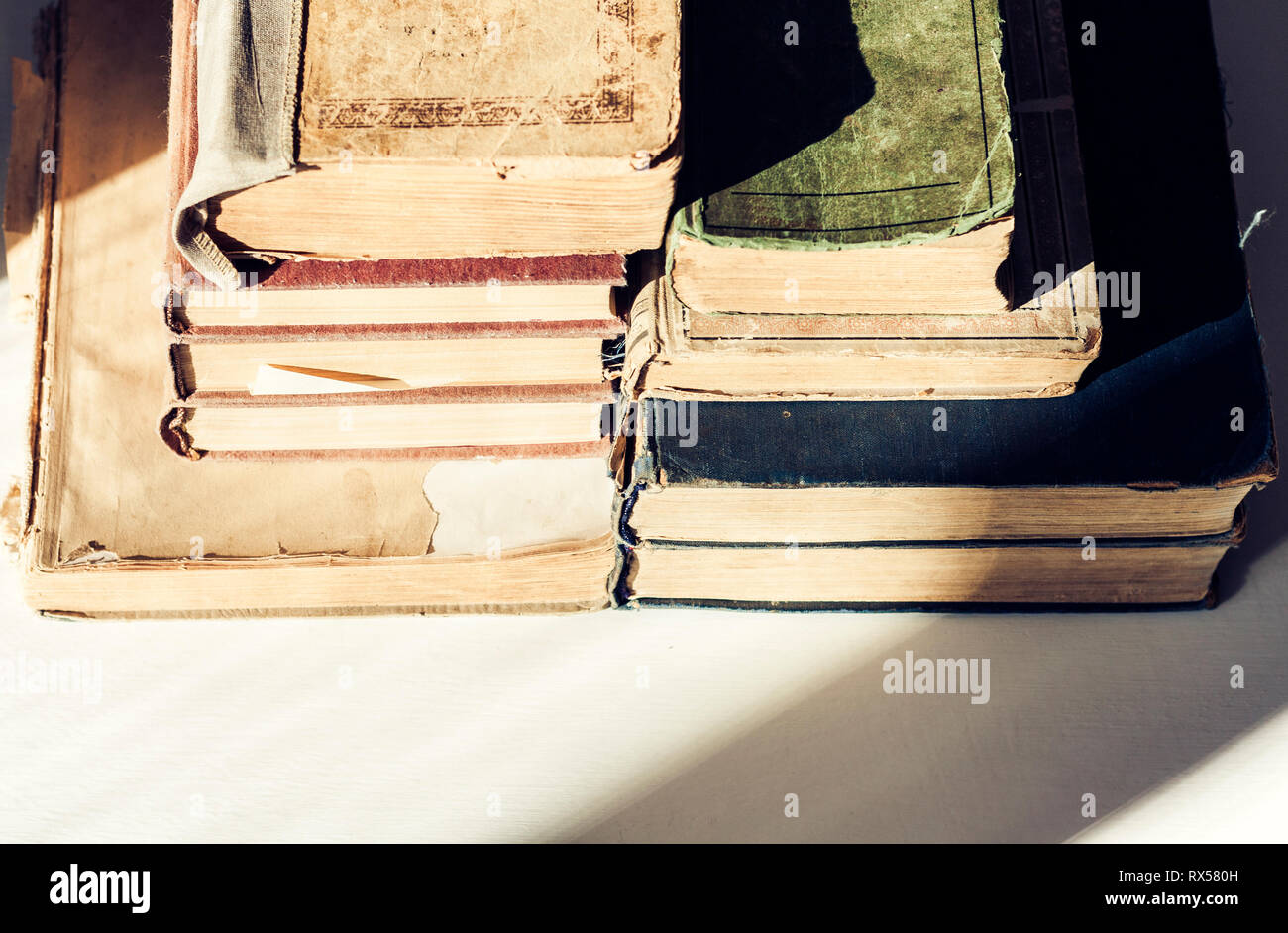 Stack of old books education retro concept background, many books piles ...