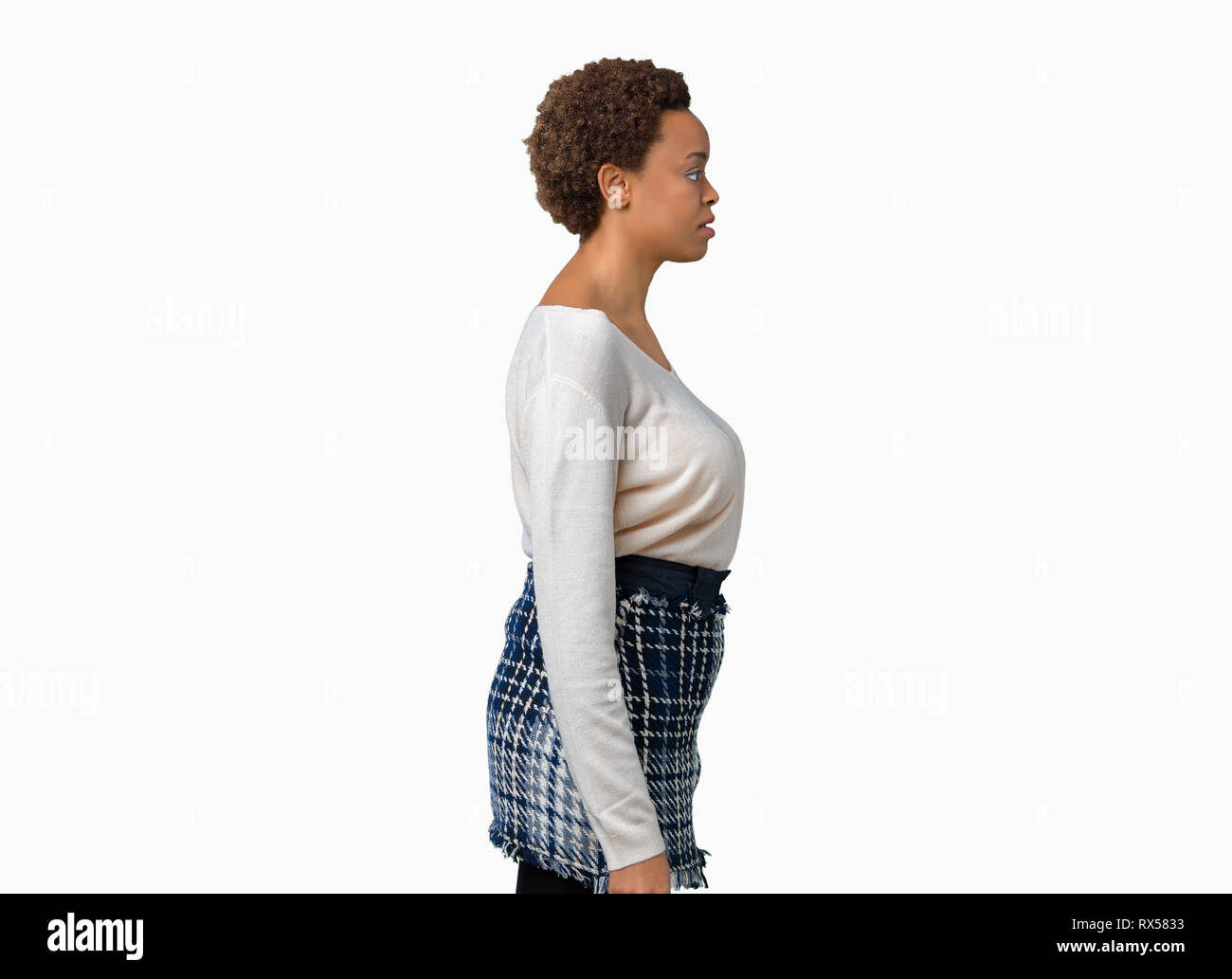 Young african american woman over isolated background looking to side ...