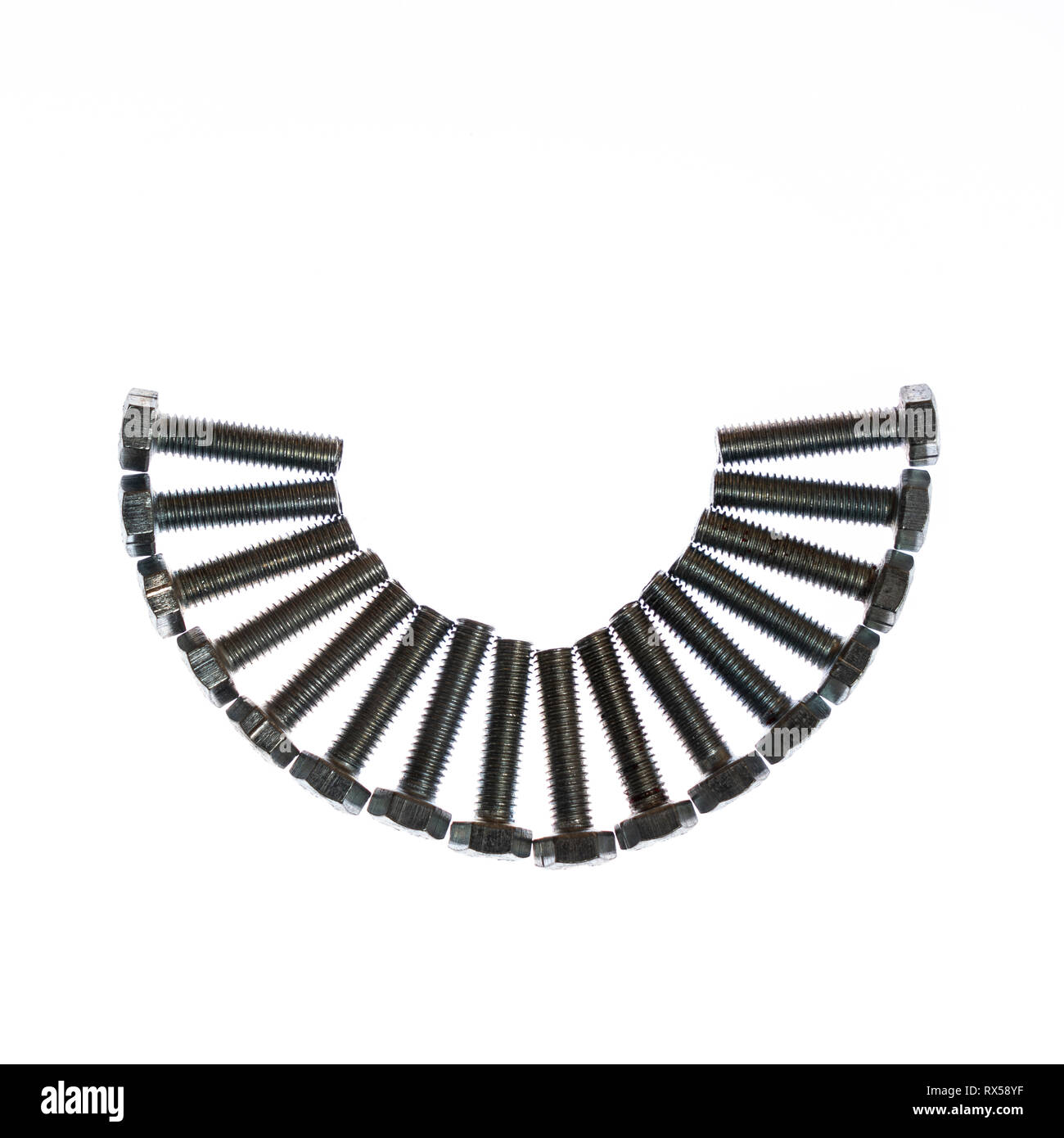 some bolts arranged in a semicircle on a white background Stock Photo ...