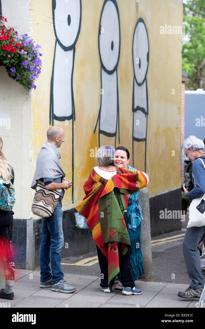 Women hug friends in hi-res stock photography and images - Alamy