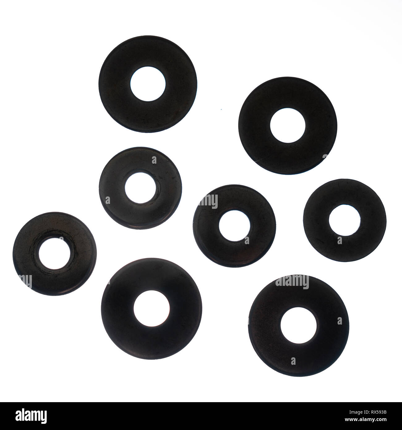 some washers of various sizes on a white background Stock Photo - Alamy