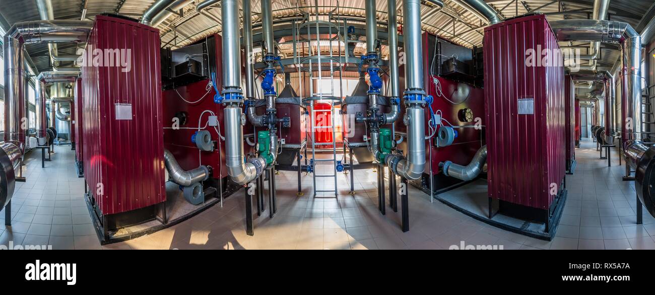 Wide-angle panoramic photo of the newest alternative fuel boiler room ...