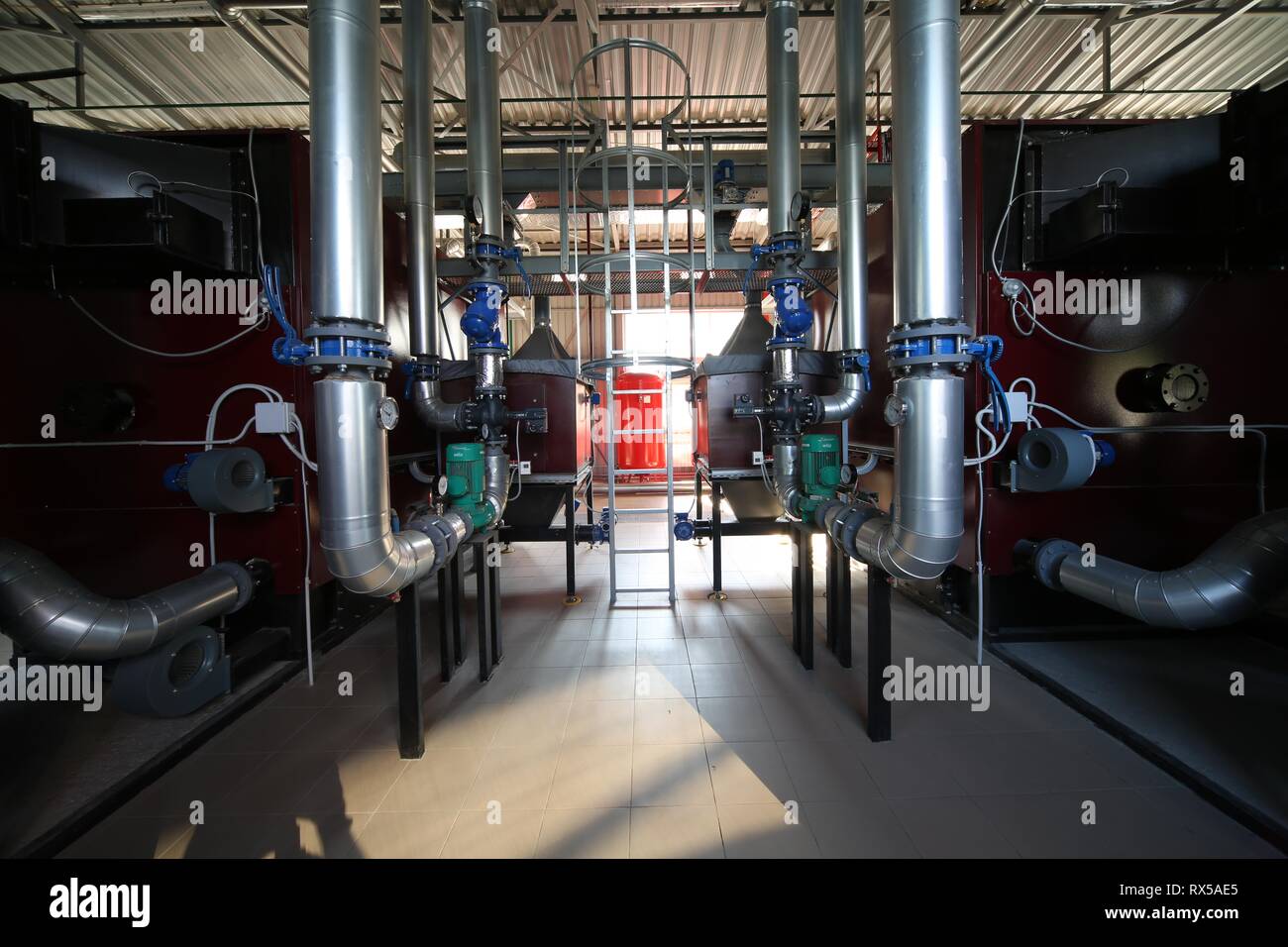Wide-angle panoramic photo of the newest alternative fuel boiler room ...