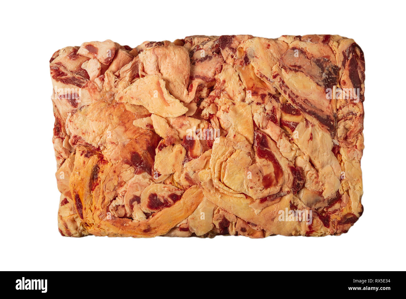 Frozen block of beef on a white background Stock Photo - Alamy