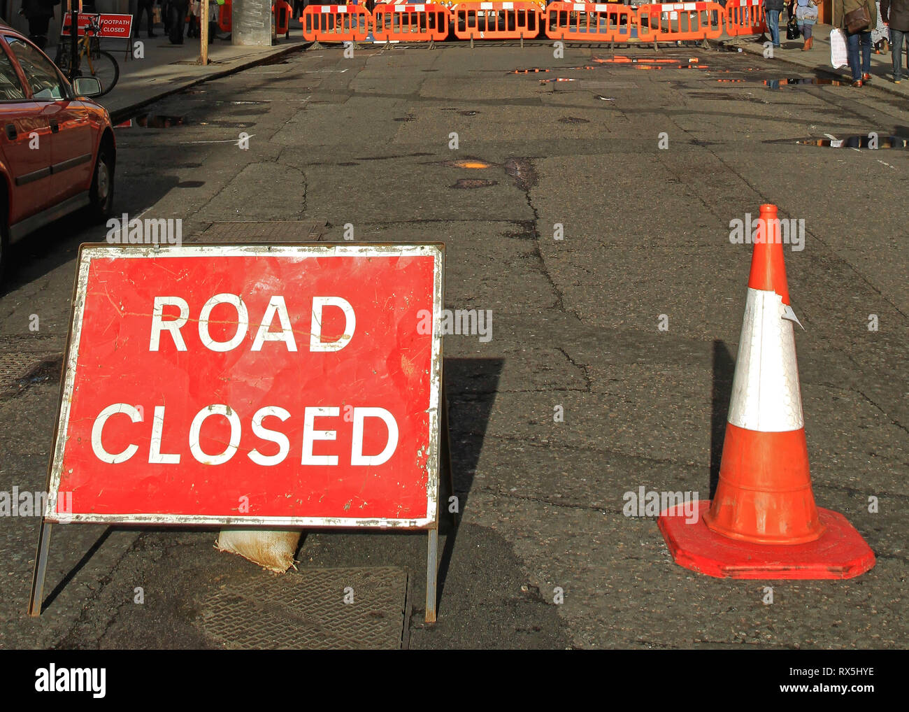 Warning Sign and Traffic Cones on a Street Closed for Road Works Stock ...