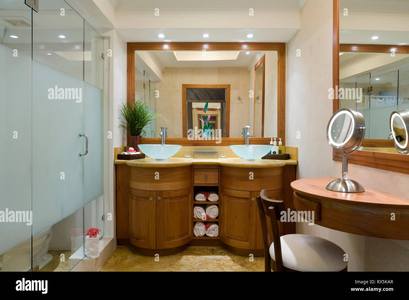Wooden vanity in hotel bathroom Stock Photo - Alamy