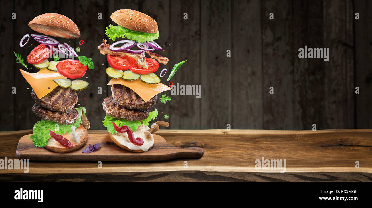 Hamburger ingredients falling down one by one to create a perfect meal ...