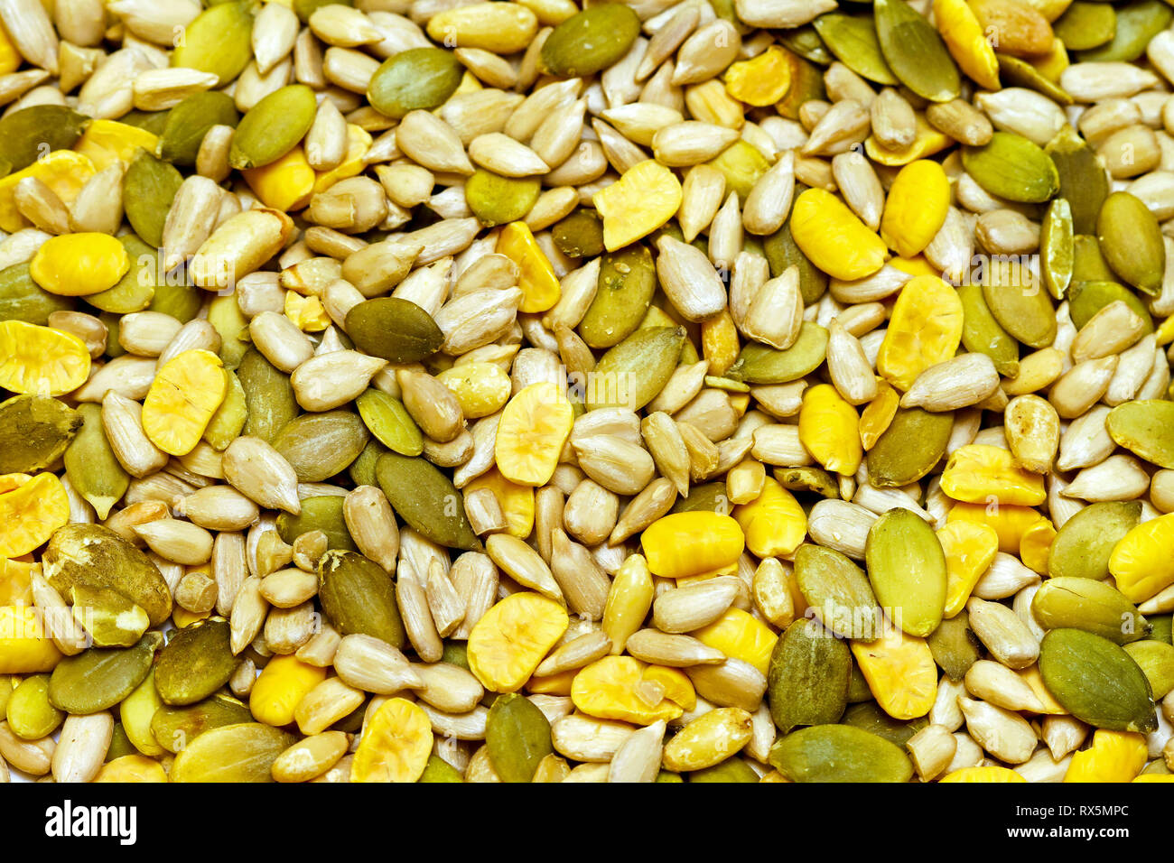 Big pile of healthy dried seeds mix Stock Photo - Alamy