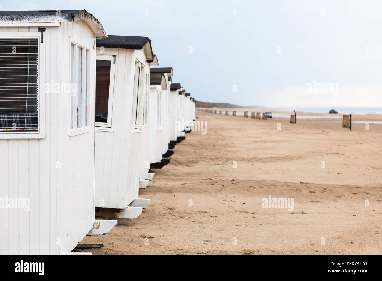 Row white beach cabins hi-res stock photography and images - Alamy