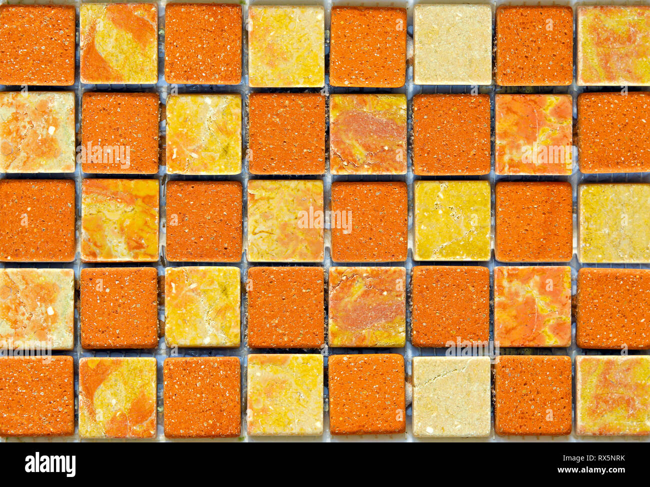Terracotta tiles in yellow and orange color Stock Photo - Alamy