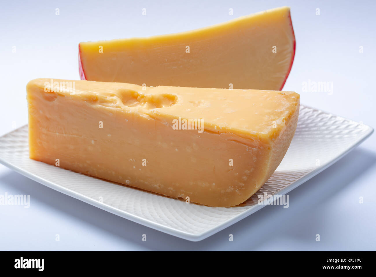 Assortment of traditional Dutch hard old cheeses made from cow milk ...