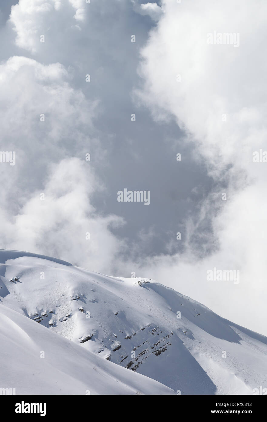 Mountains Snow and Clouds Stock Photo - Alamy