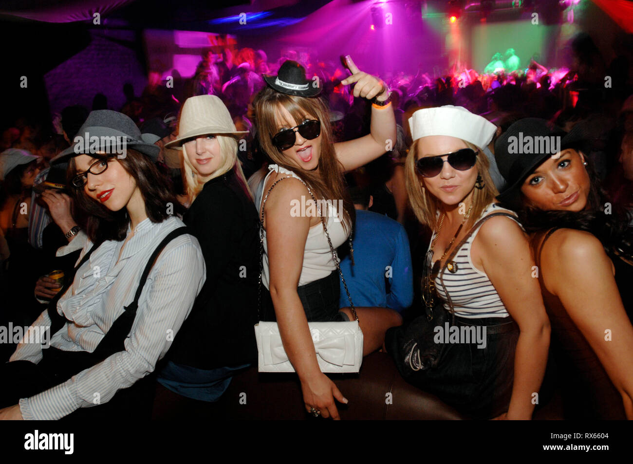 Clubbers in hats hi-res stock photography and images - Alamy