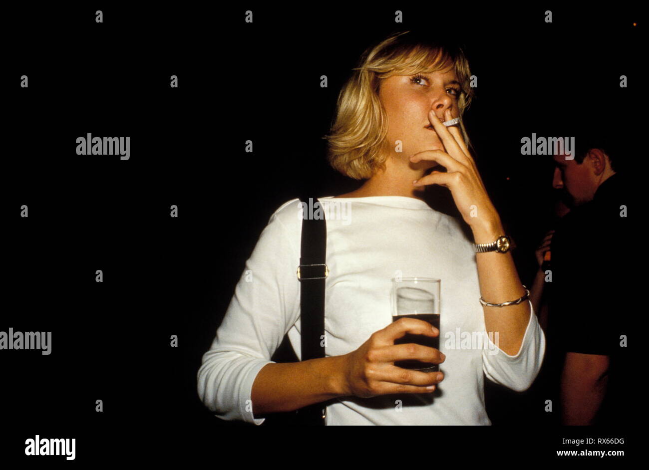 Woman smoking in bar hi-res stock photography and images - Alamy