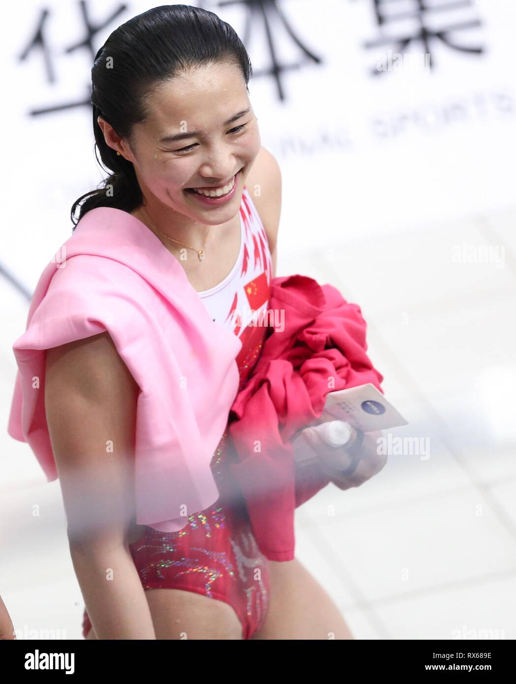 Beijing, China. 8th Mar, 2019. China's Wang Han smiles after the women ...
