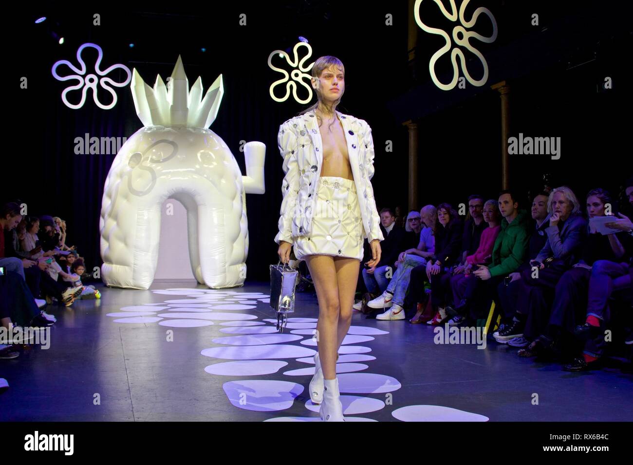 Amsterdam, Netherlands. 8th Mar, 2019. A model presents a creation at ...