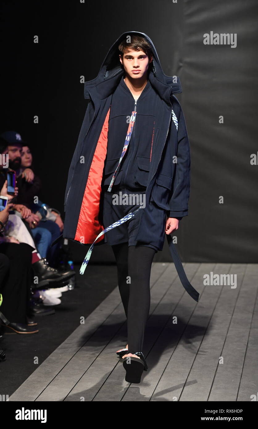 Lisbon, Portugal. 8th Mar, 2019. A model presents a creation of ...