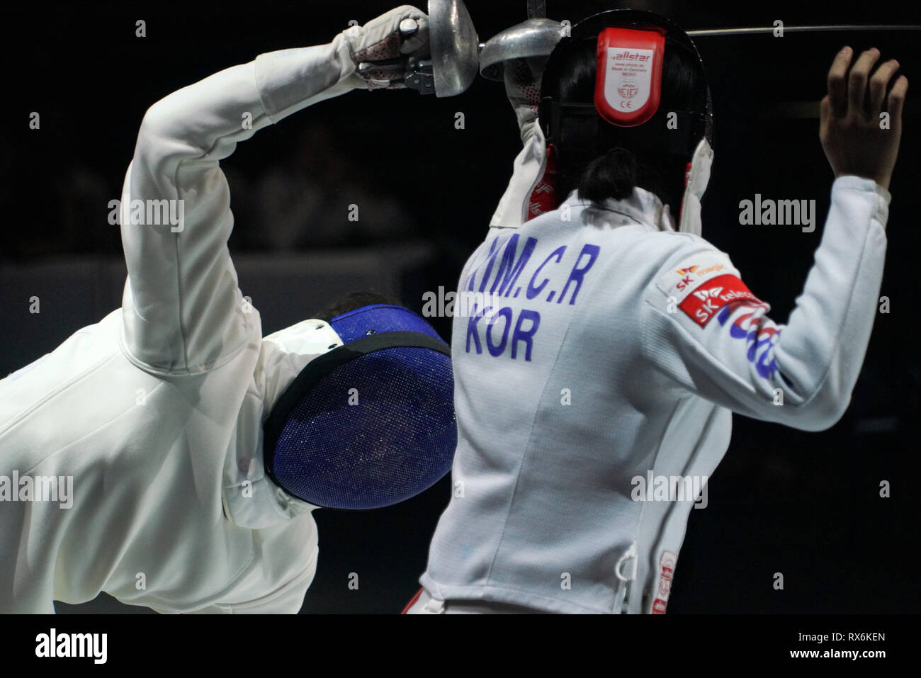 Al Salt, Jordan. 8th Mar, 2019. Qu Xiaoxiao (L) of China competes with ...