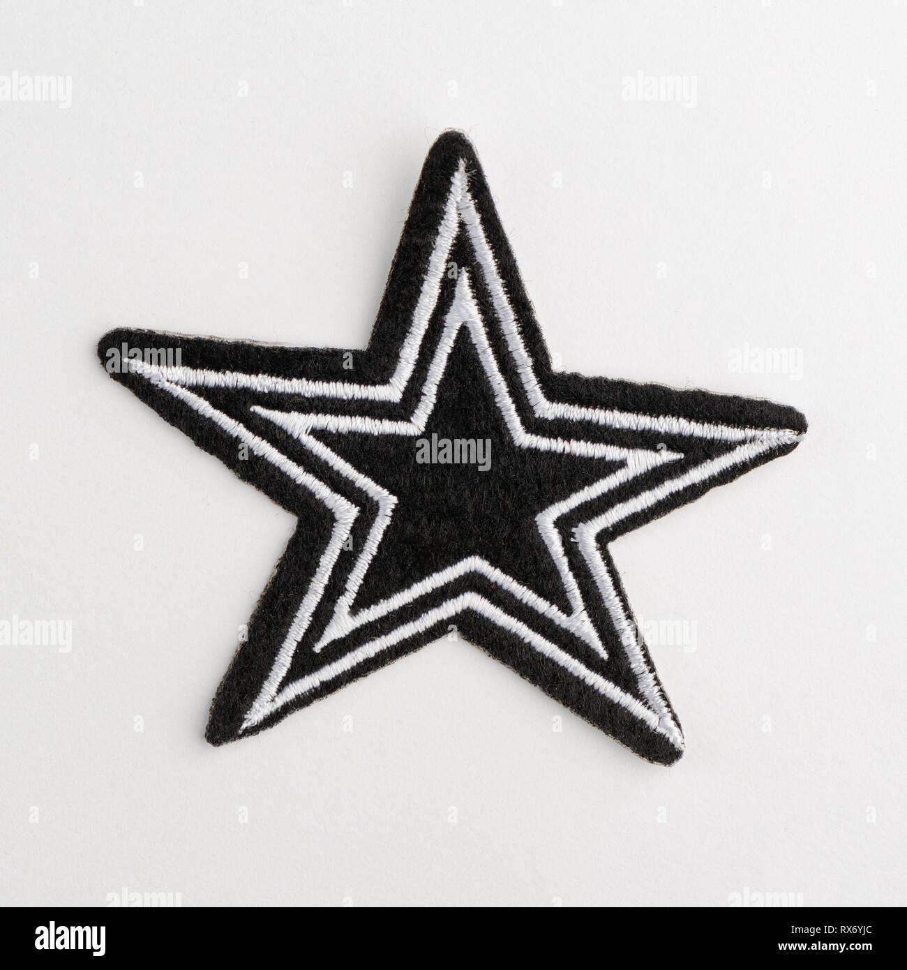 Black star fabric patch Stock Photo - Alamy