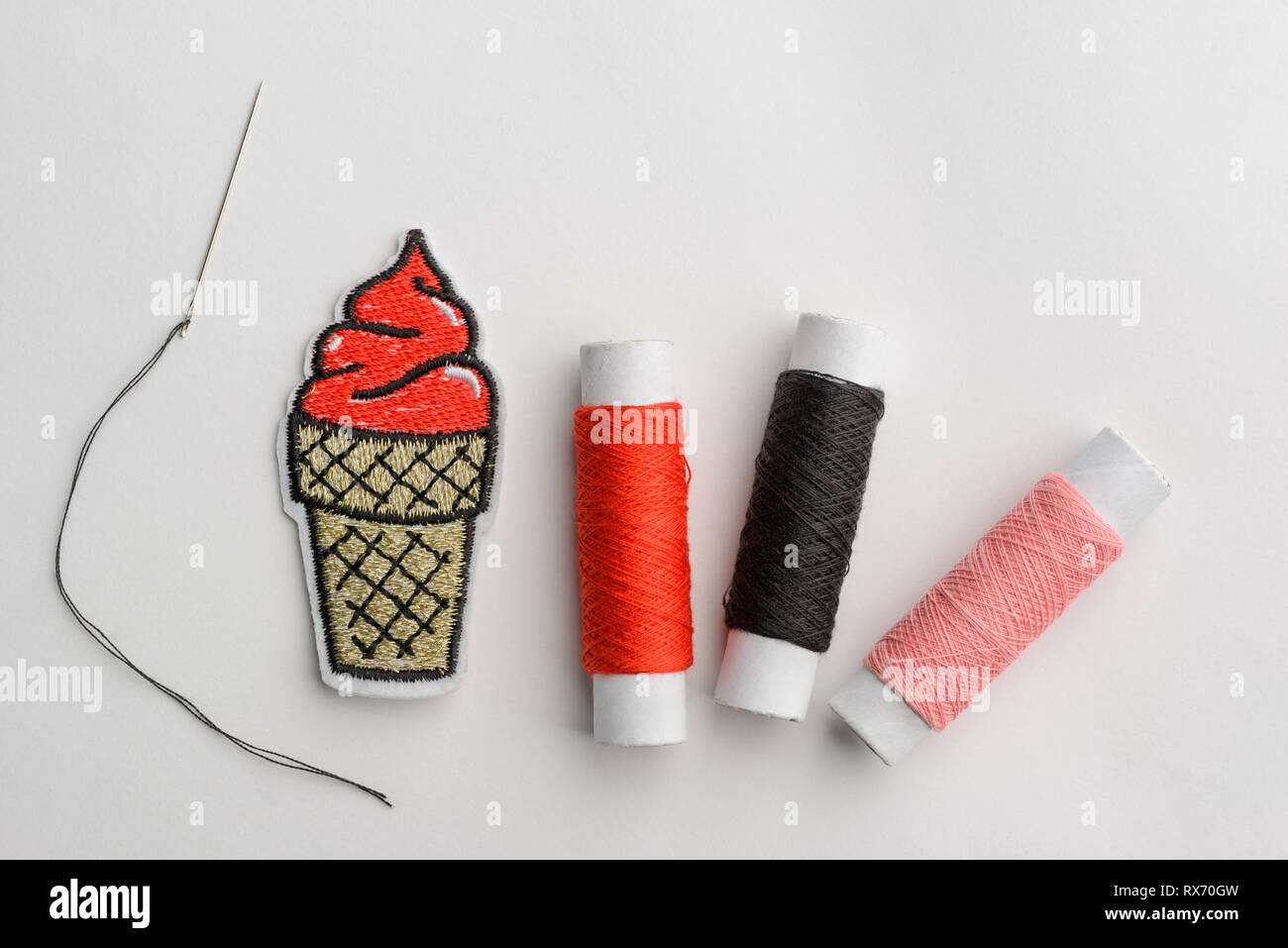 Needle and thread and fabric patch hi-res stock photography and images ...