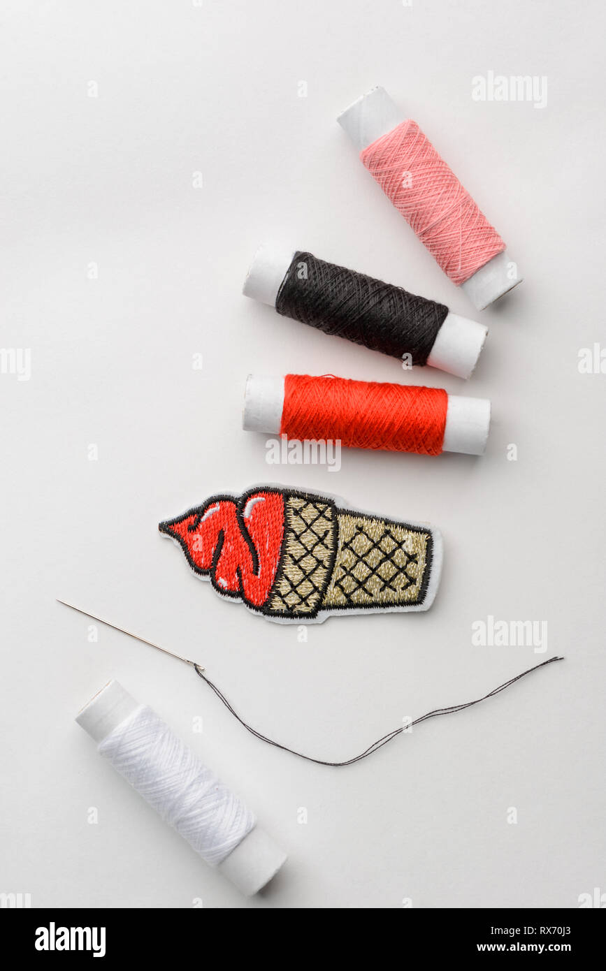 Needle and thread patch hi-res stock photography and images - Alamy