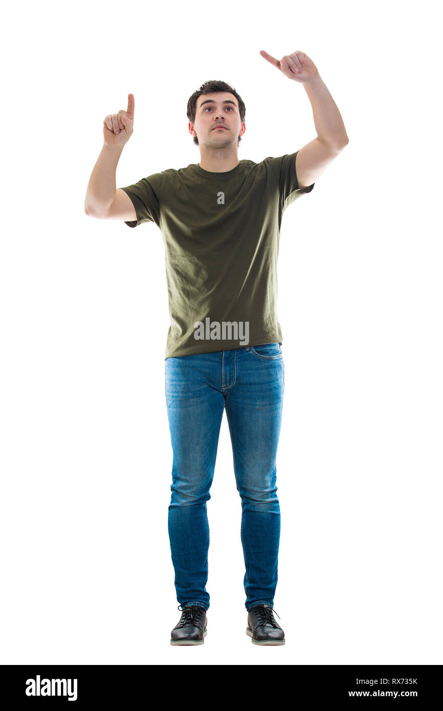 Full length portrait casual young man pressing an imaginative button ...