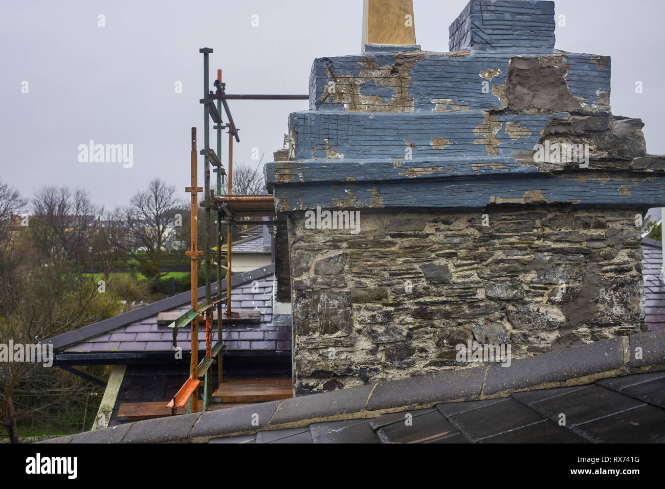 Isle of Man chimney stack about to be re-rendered and showing stone ...