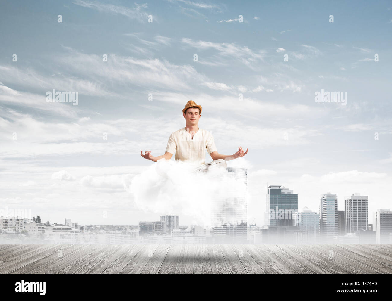 Young man keeping mind conscious Stock Photo - Alamy