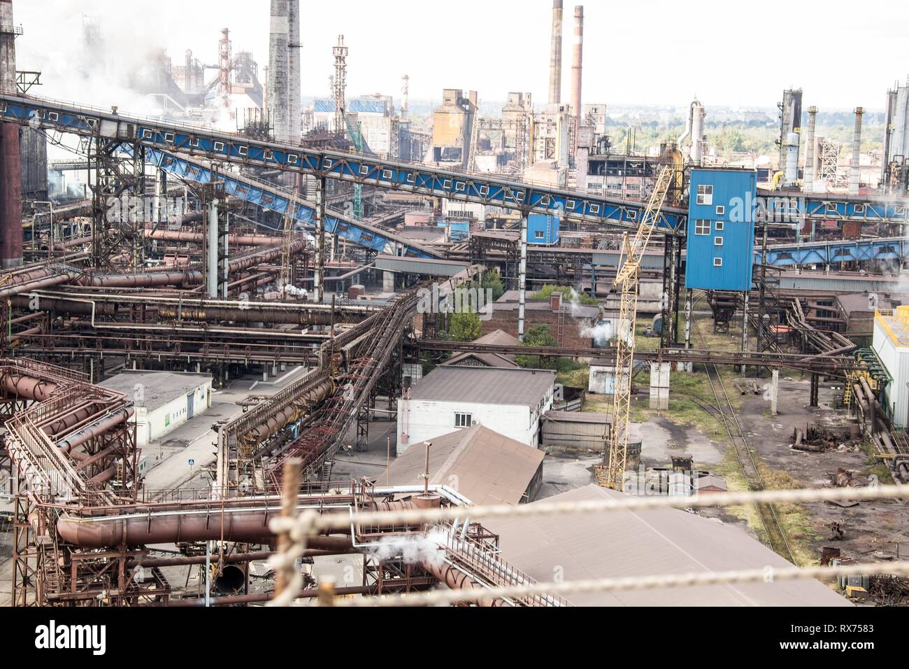 landscape, panorama, view of factory slums with metal hulls and ...