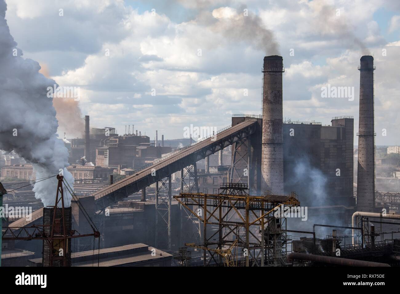 landscape, panorama, view of factory slums with metal hulls and ...