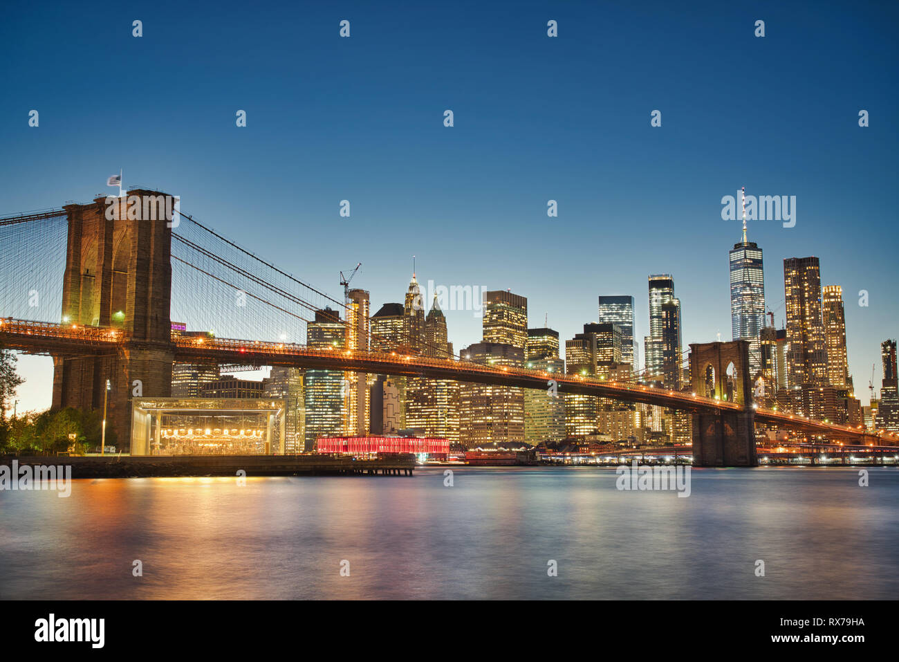 Photo of the Brooklyn Bridge from DUMBO at the sunset tine Stock Photo ...