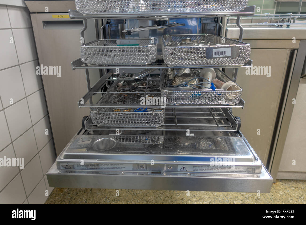 used surgical instruments are in a washing machine Stock Photo - Alamy