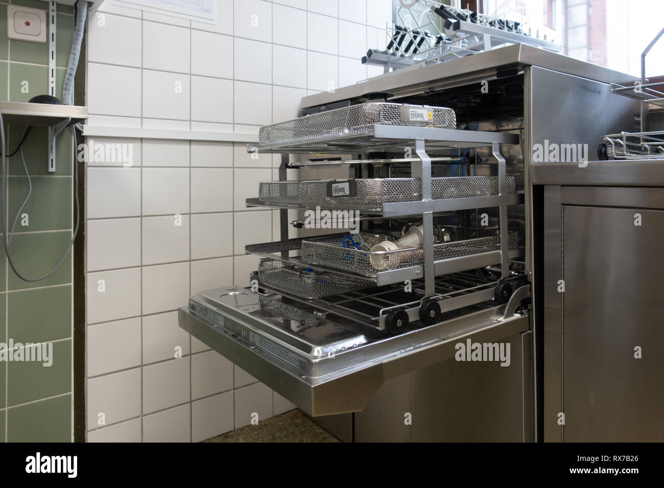 used surgical instruments are in a washing machine Stock Photo - Alamy