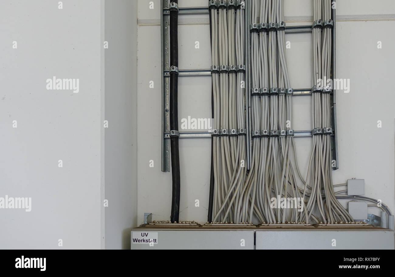 many power cables lead to a fuse box Stock Photo - Alamy