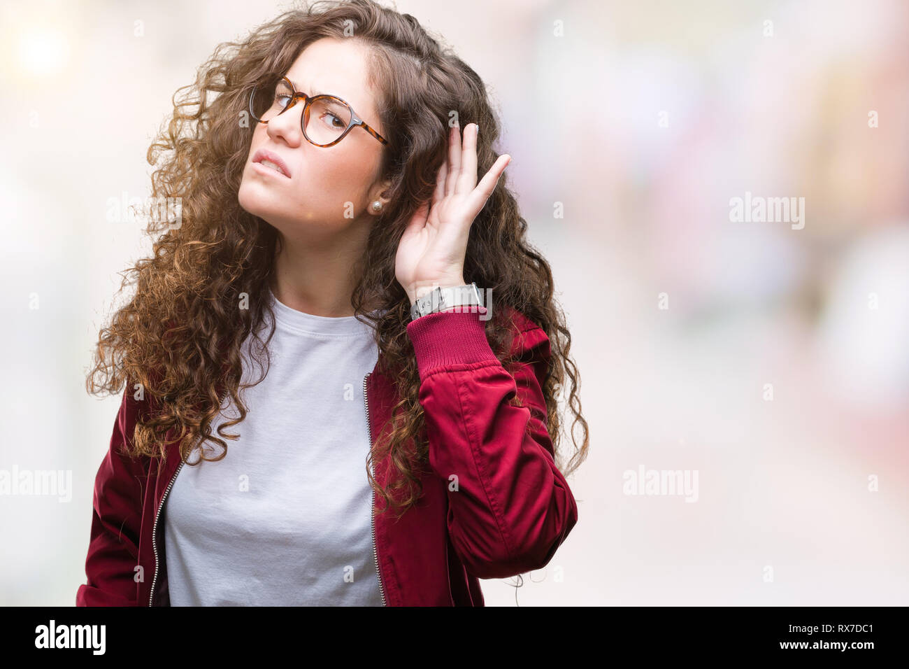 Beautiful Brunette Curly Hair Young Girl Wearing Jacket And Glasses Over Isolated Background