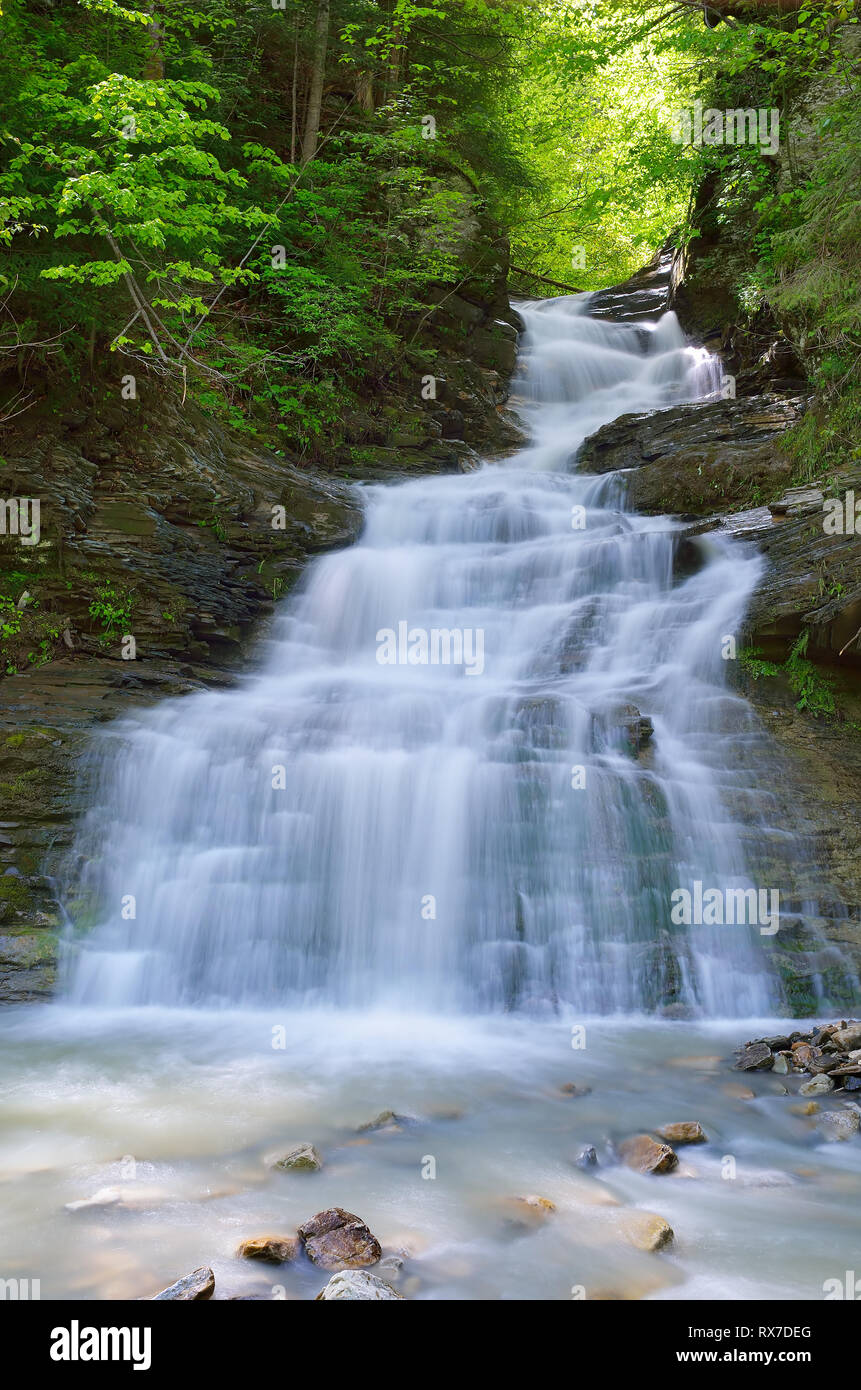Spring landscape with a waterfall on a mountain river Stock Photo - Alamy