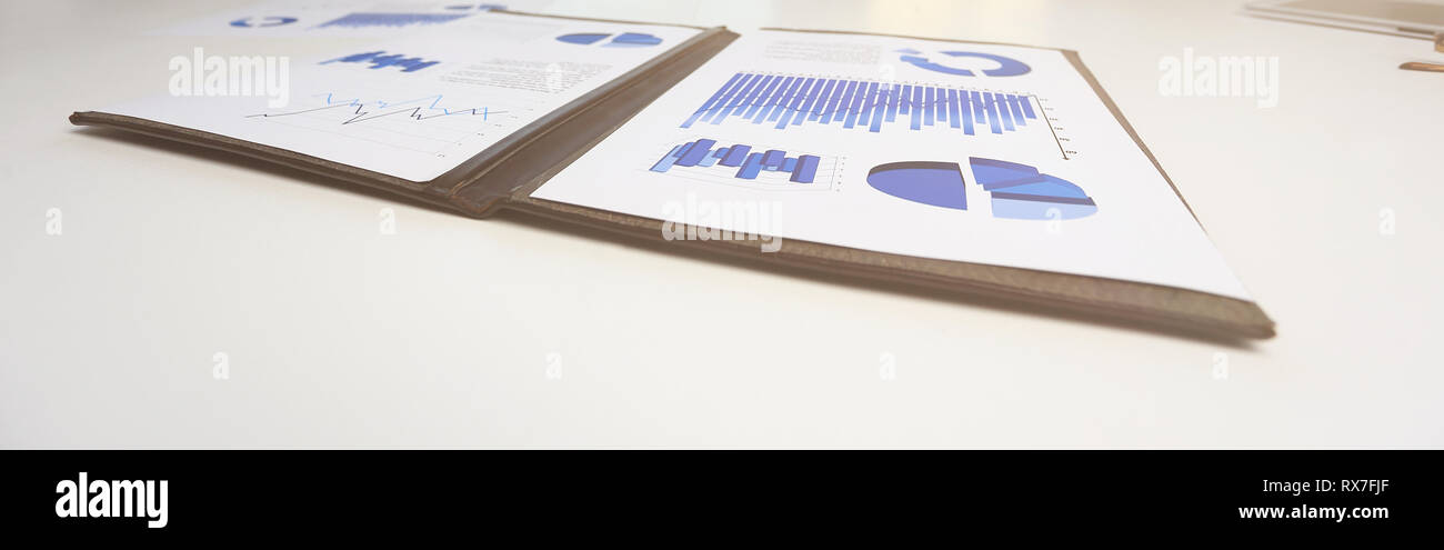 business report and documents statistics on the office workplace Stock ...
