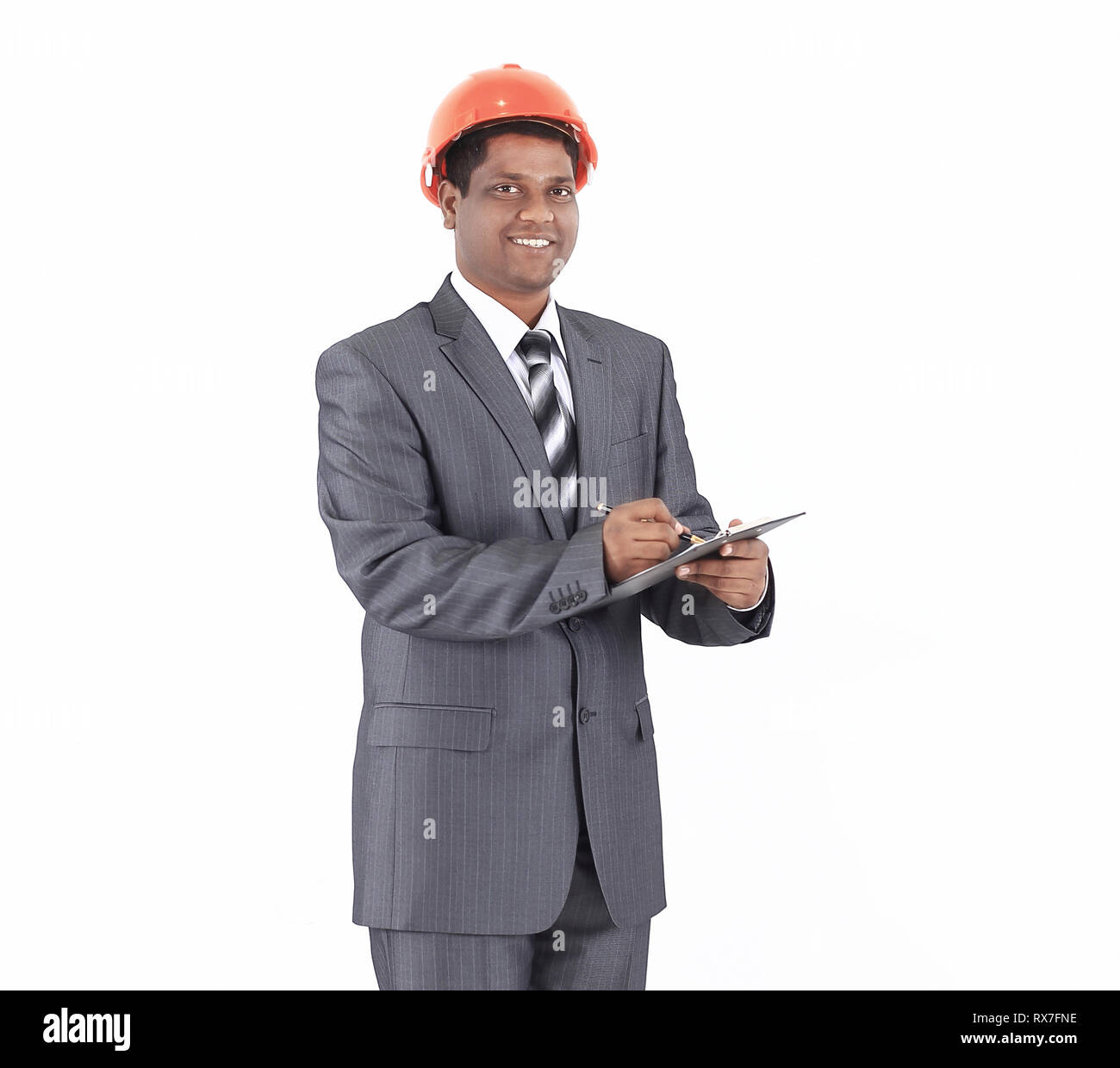 handsome engineer architect signing a contract.isolated on white Stock ...