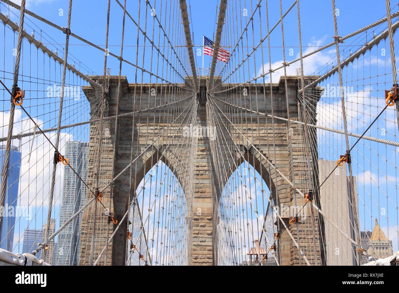 New York City, United States - famous Brooklyn Bridge with US flag ...