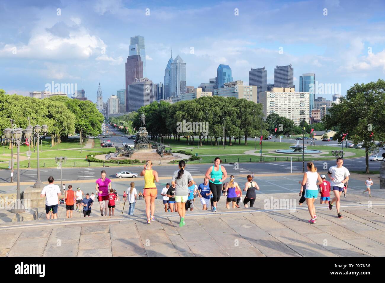 PHILADELPHIA, USA - JUNE 11, 2013: People run down famous Rocky Steps ...