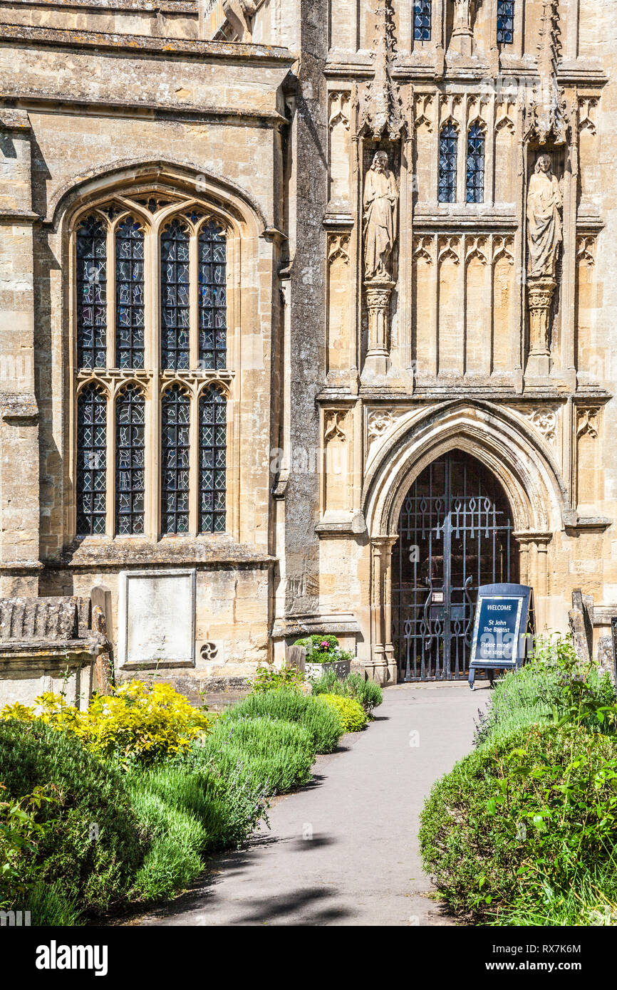 A typical English country church in the Cotswold town of Burford in ...