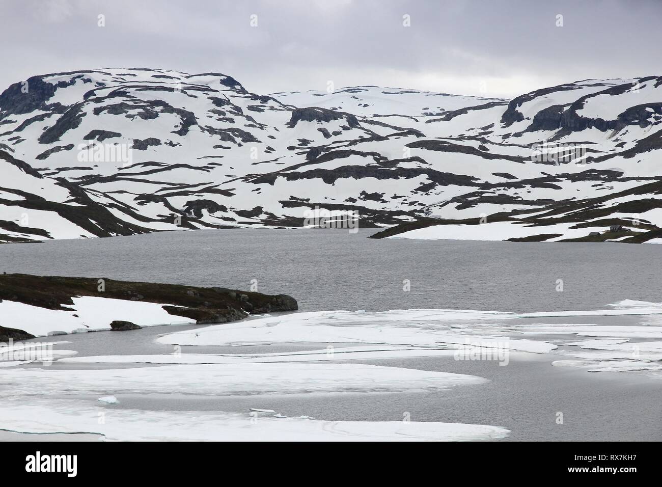 Telemark landscape in Norway. Haukelifjell mountain area. Snow in July ...
