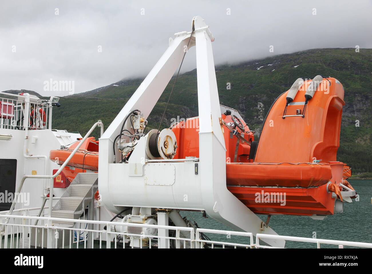 Lifeboat attached to a ferry in Norway Stock Photo - Alamy