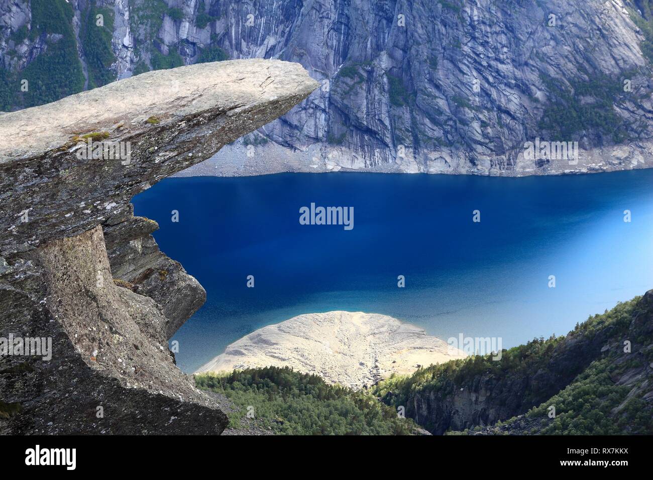 Troll's Tongue in Norway. Tourist attraction known as Trolltunga. Rock ...