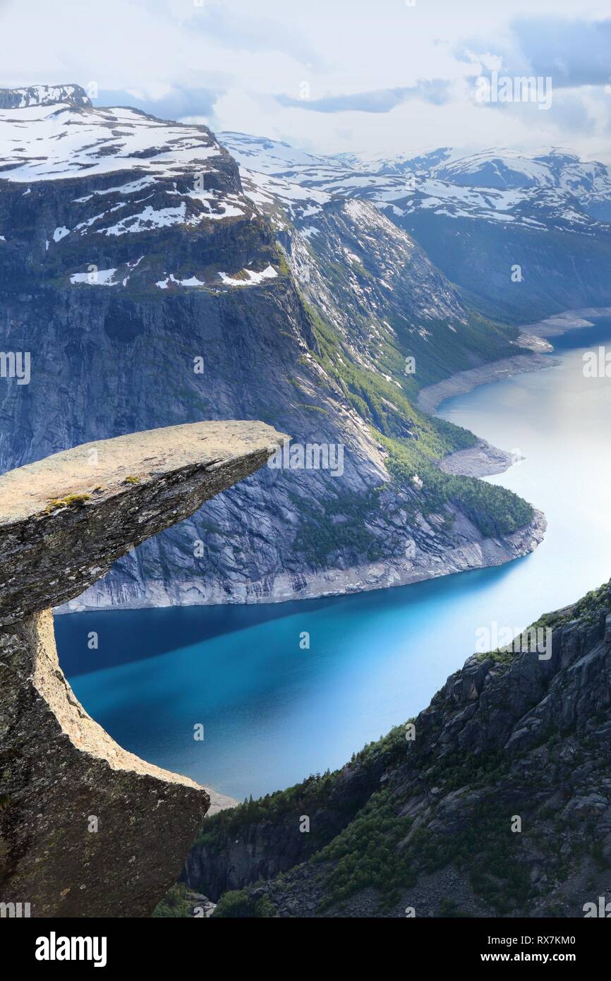 Troll's Tongue in Norway. Tourist attraction known as Trolltunga. Rock ...