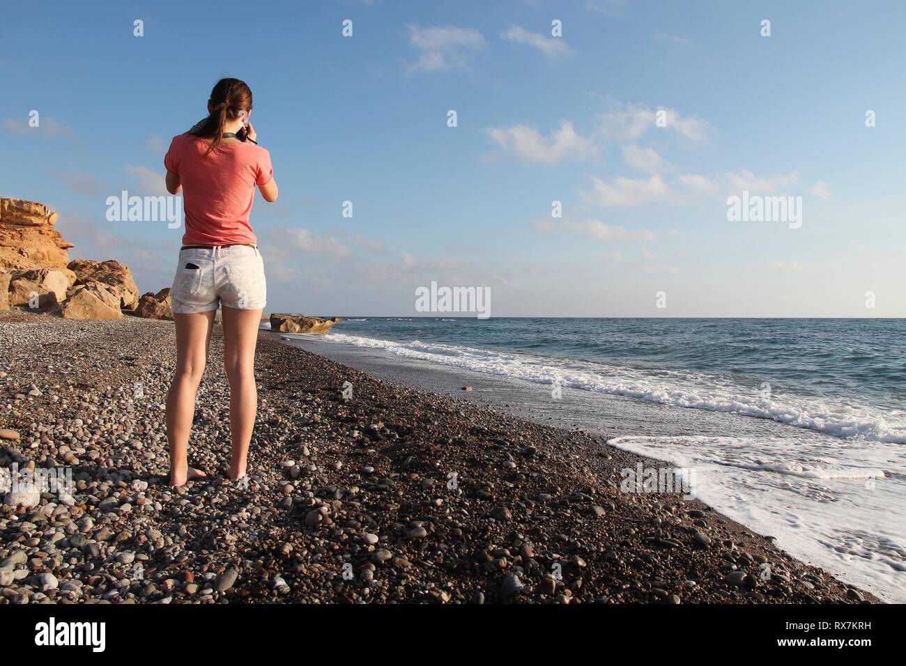 Female tourist takes photos near Paphos, Cyprus Stock Photo - Alamy