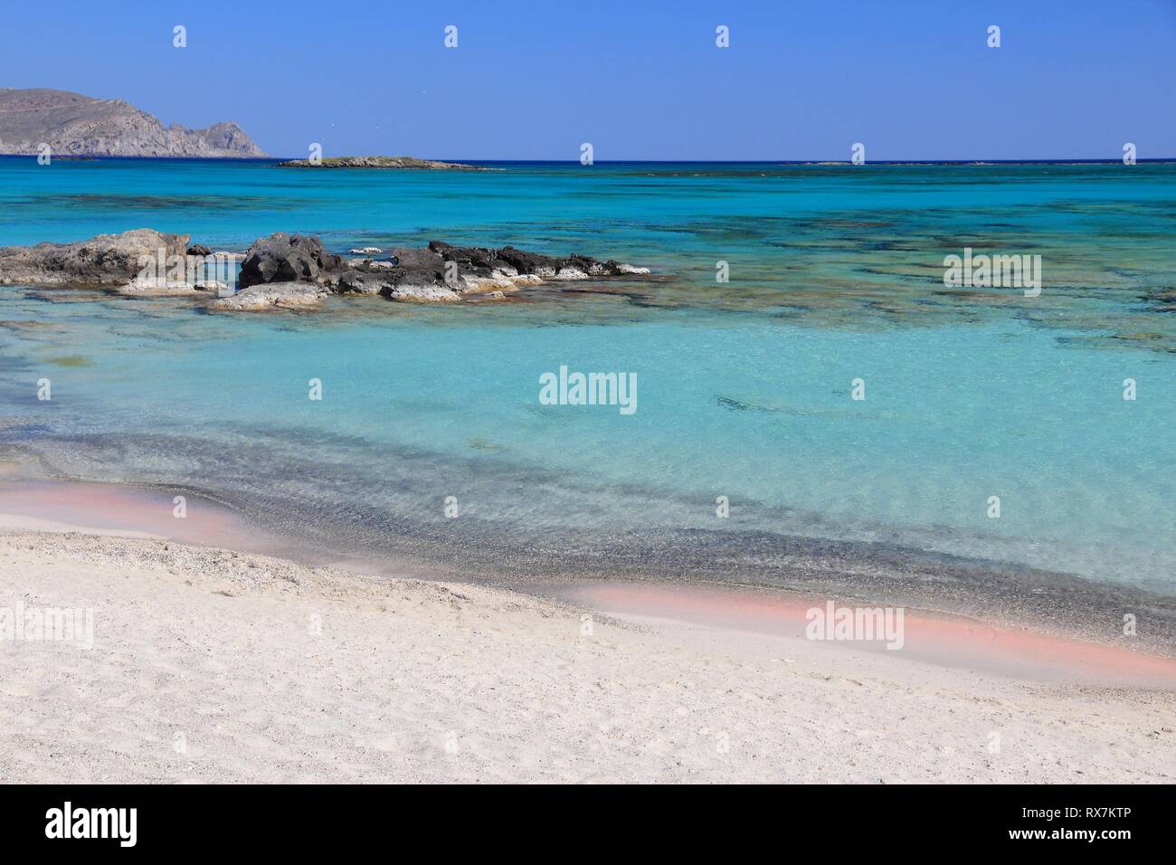 Coast of Crete island in Greece. Pink sandy beach in famous Elafonisi ...