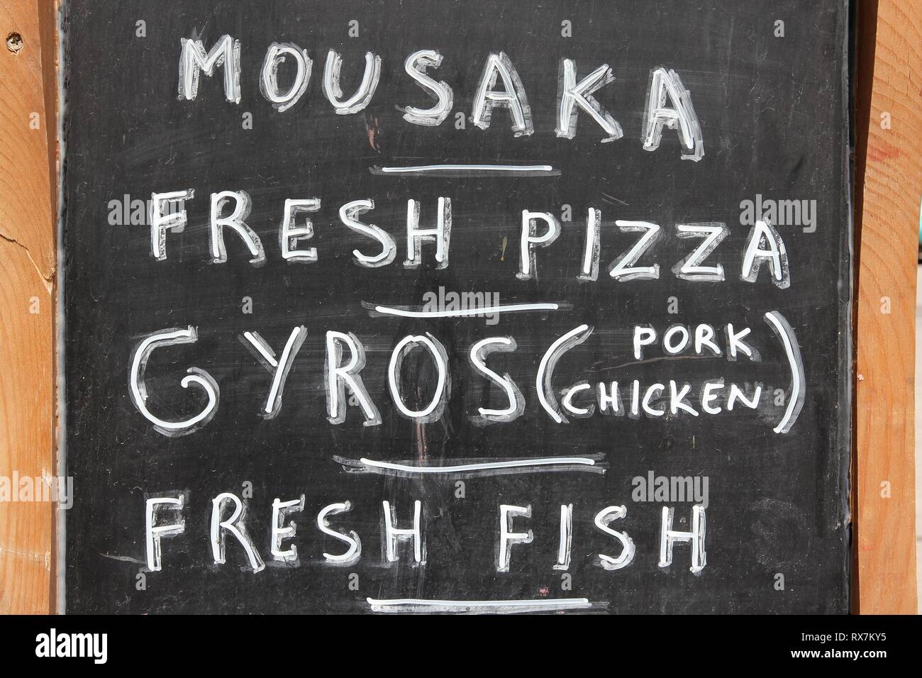 Restaurant menu in Crete island - Greek cuisine blackboard Stock Photo ...