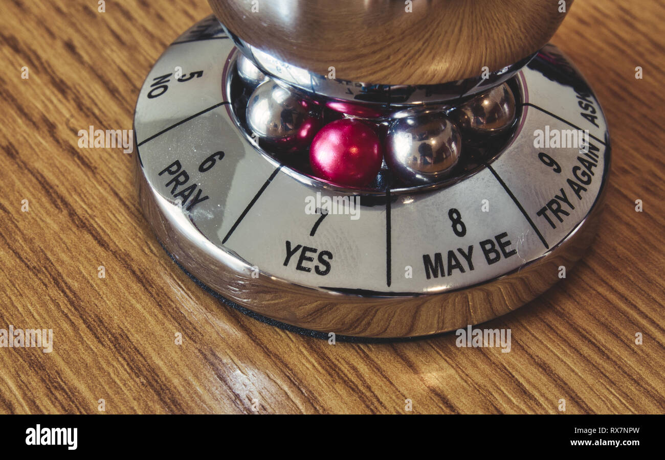 Metal decision maker with 'Yes' selected from the wheel of options ...