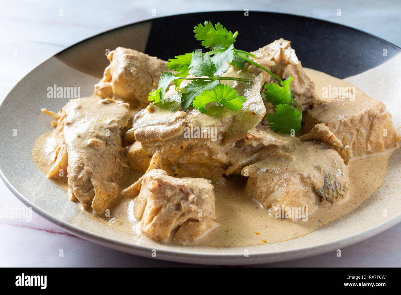 fish in walnut sauce Stock Photo - Alamy
